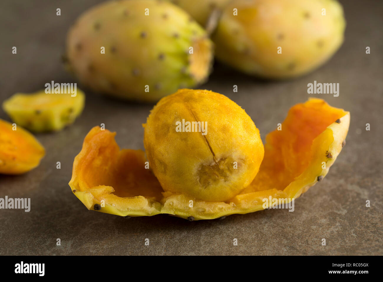 Fresh ripe yellow peeled prickly cactus fruit Stock Photo - Alamy