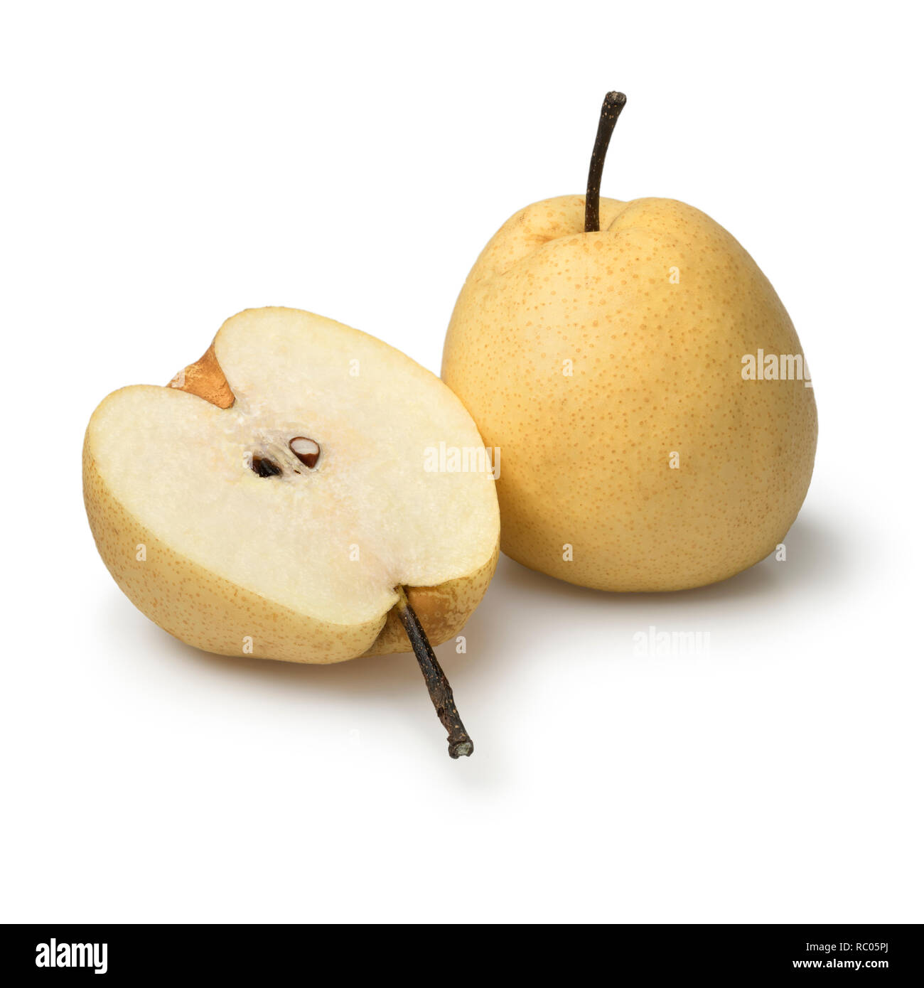 Whole and halved fresh raw chinese pear isolated on white background ...