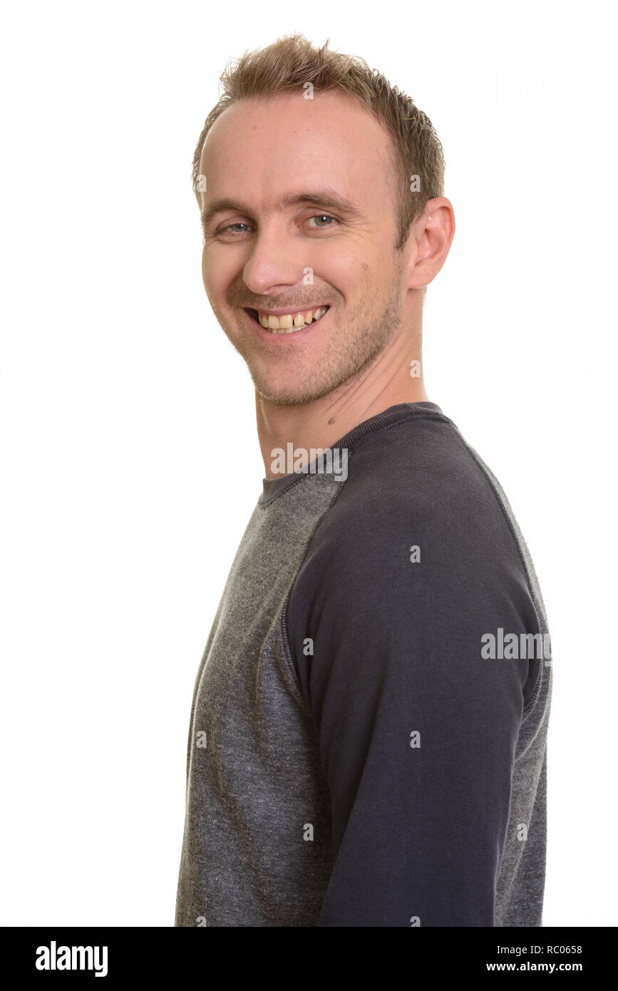 Happy handsome Caucasian man isolated against white background Stock ...