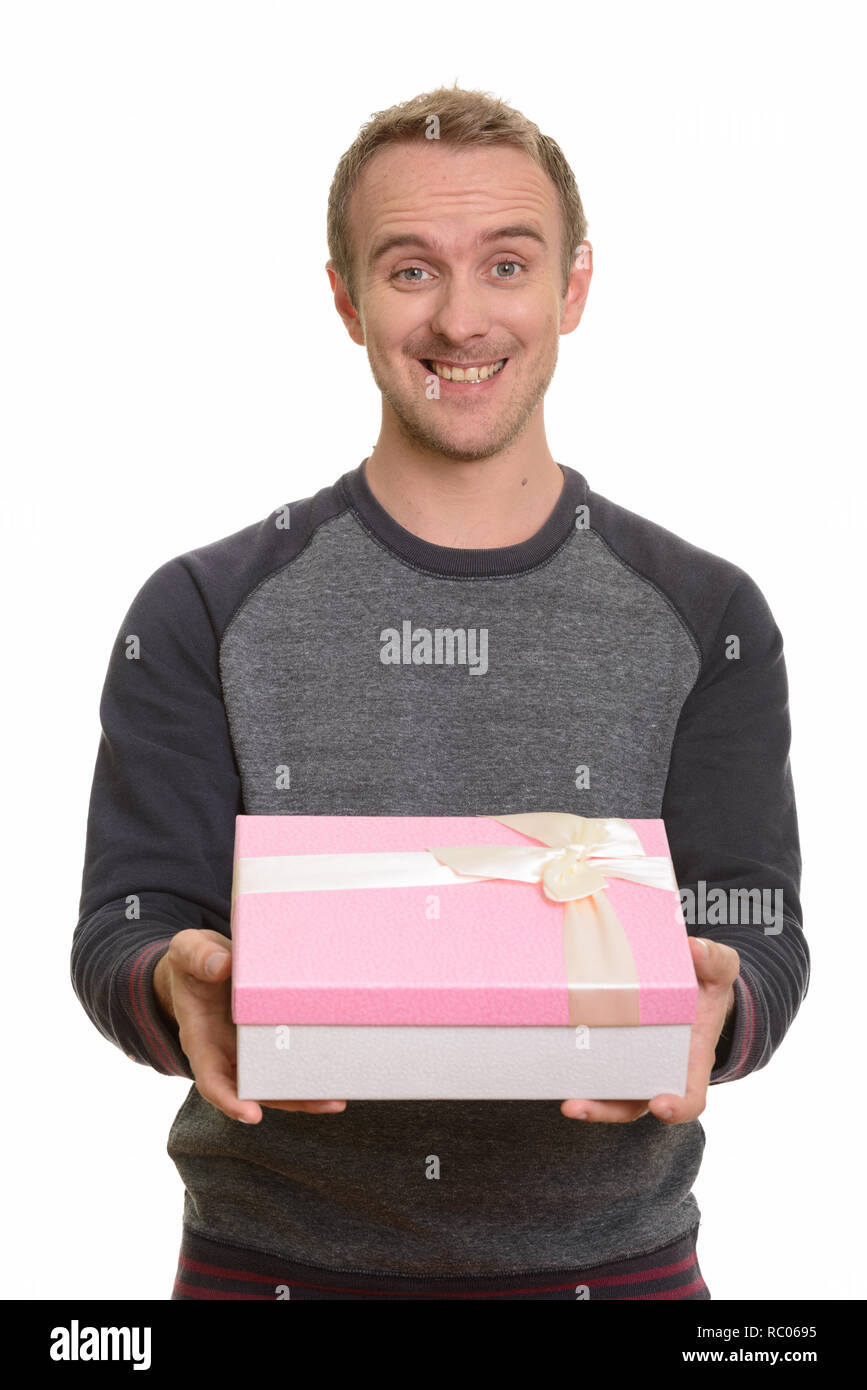 Happy handsome Caucasian man giving gift box ready for Valentine Stock ...