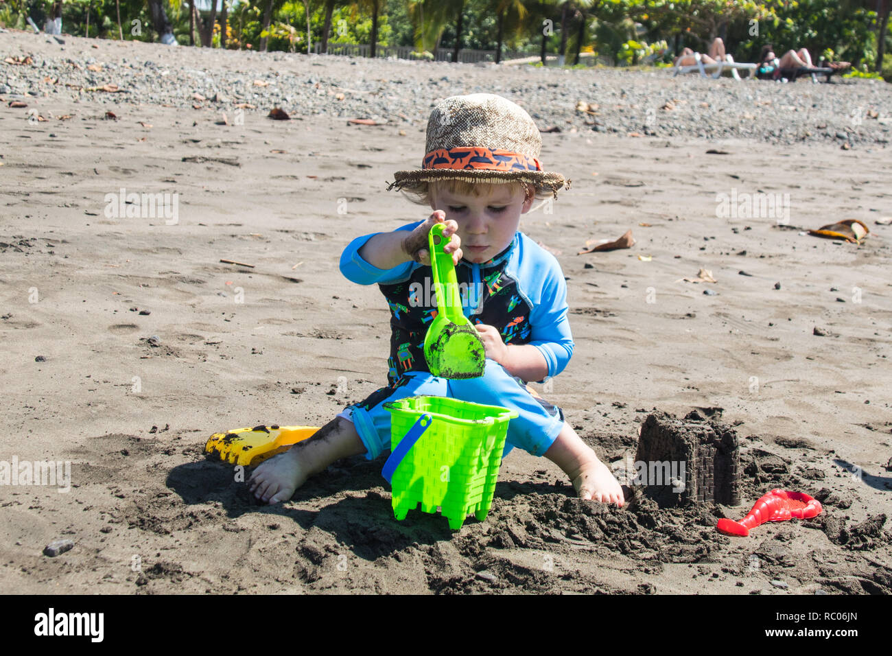 Boy sand castle hat hi-res stock photography and images - Alamy