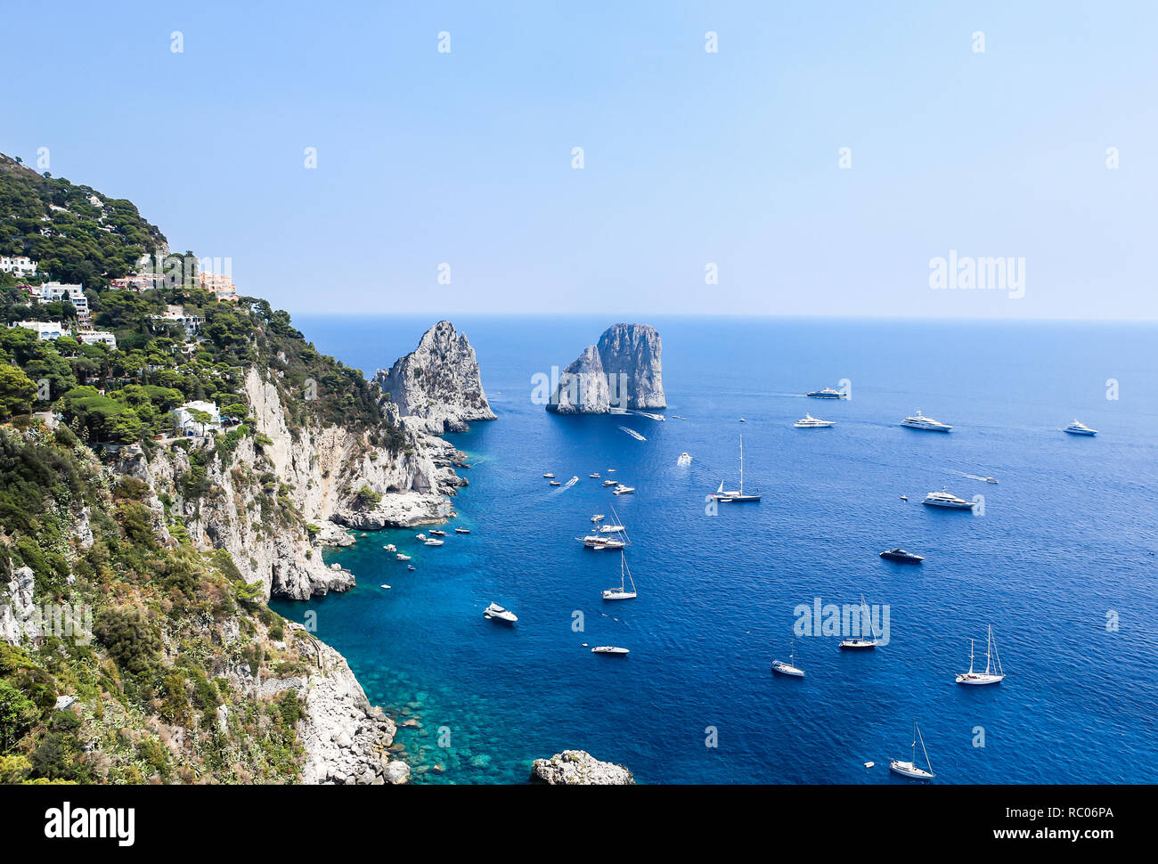 Italy. Capri Island. Faraglioni rock formation seen from Gardens of ...