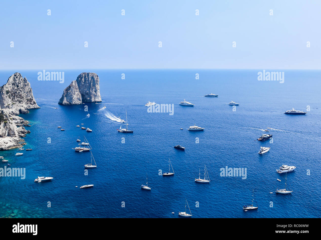 Italy. Capri Island. Faraglioni rock formation seen from Gardens of ...