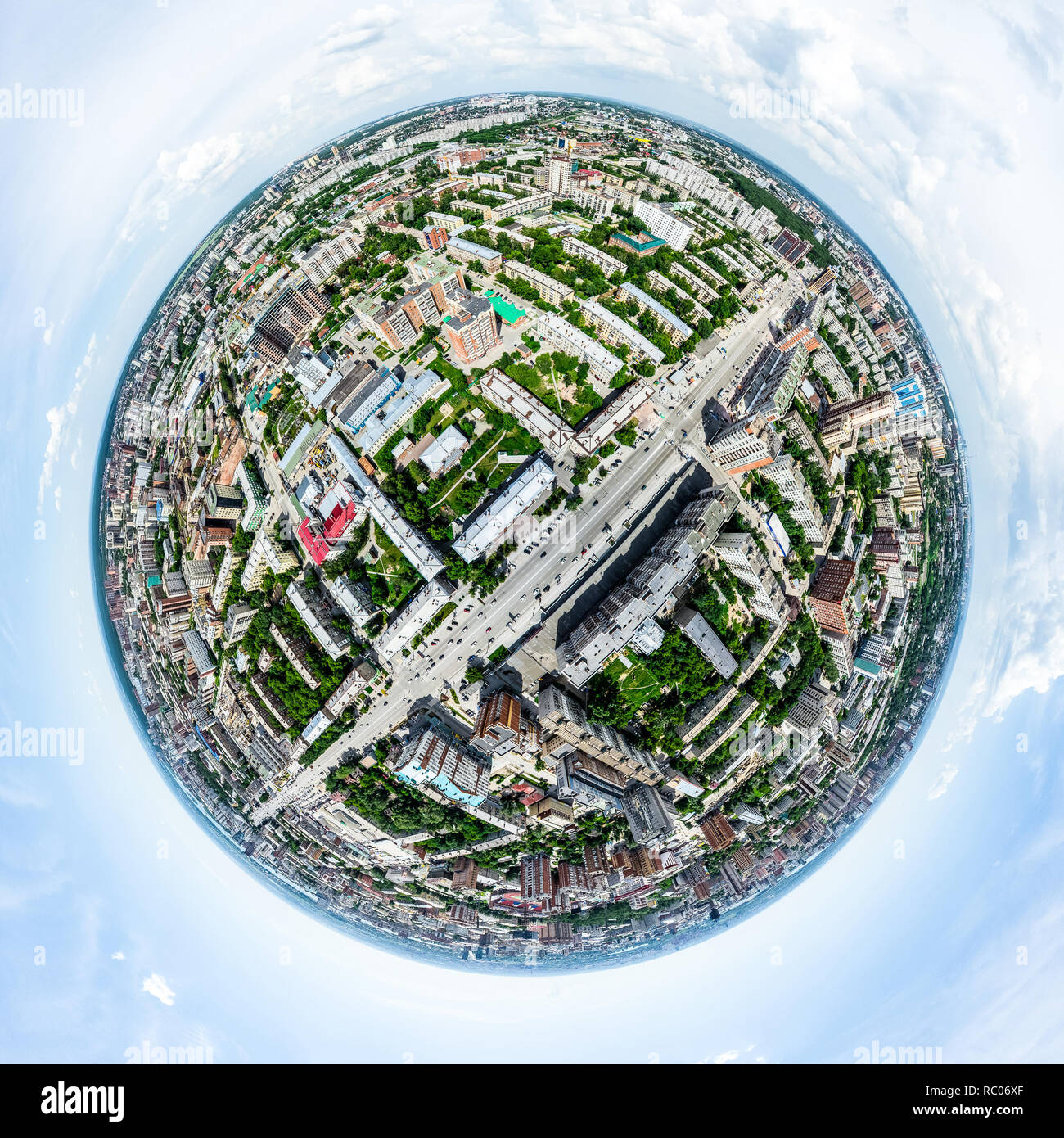 Aerial city view with crossroads and roads, houses, buildings, parks ...