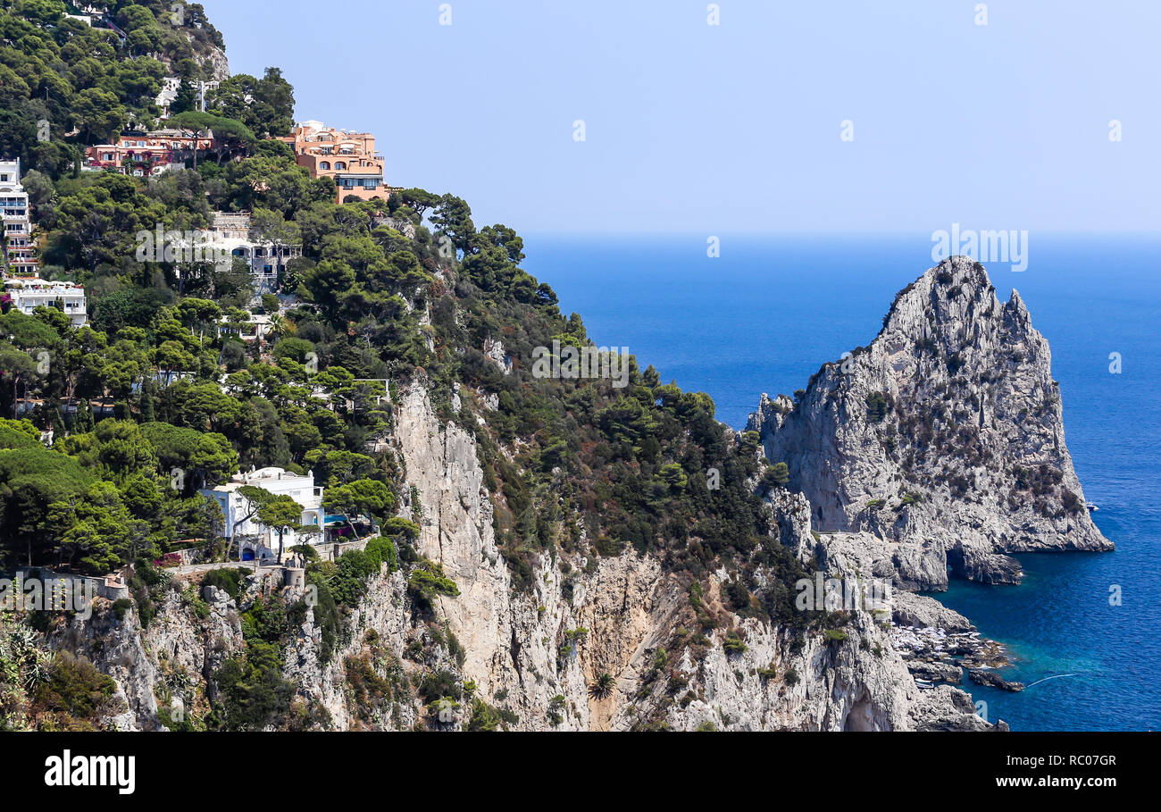 Italy. Capri Island. Faraglioni rock formation and town Capri seen from ...