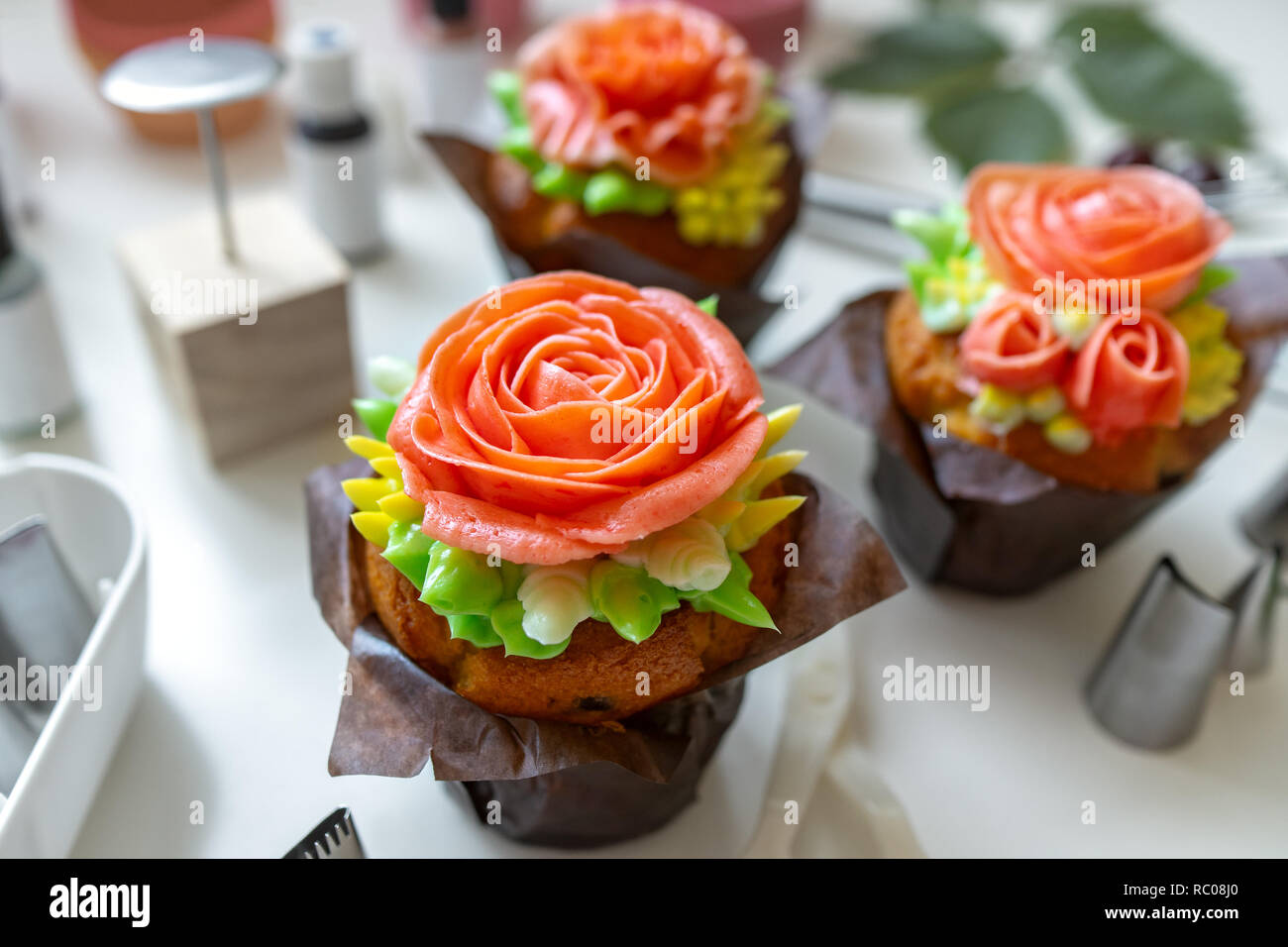 cupcake with rose, from Korean buttercream, dessert Stock Photo - Alamy