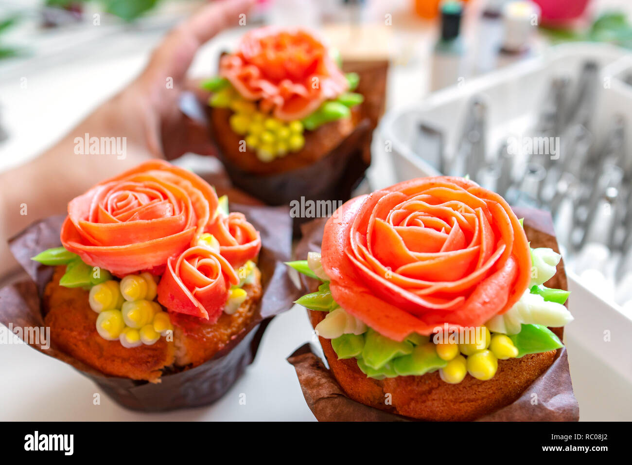cupcake with rose, from Korean buttercream, dessert Stock Photo - Alamy