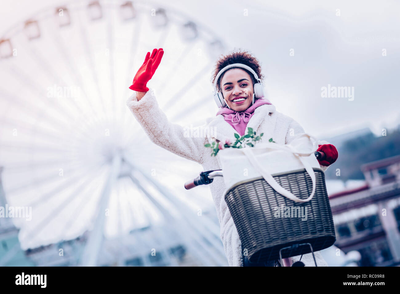 Positive delighted girl having joyful mood during walk Stock Photo - Alamy