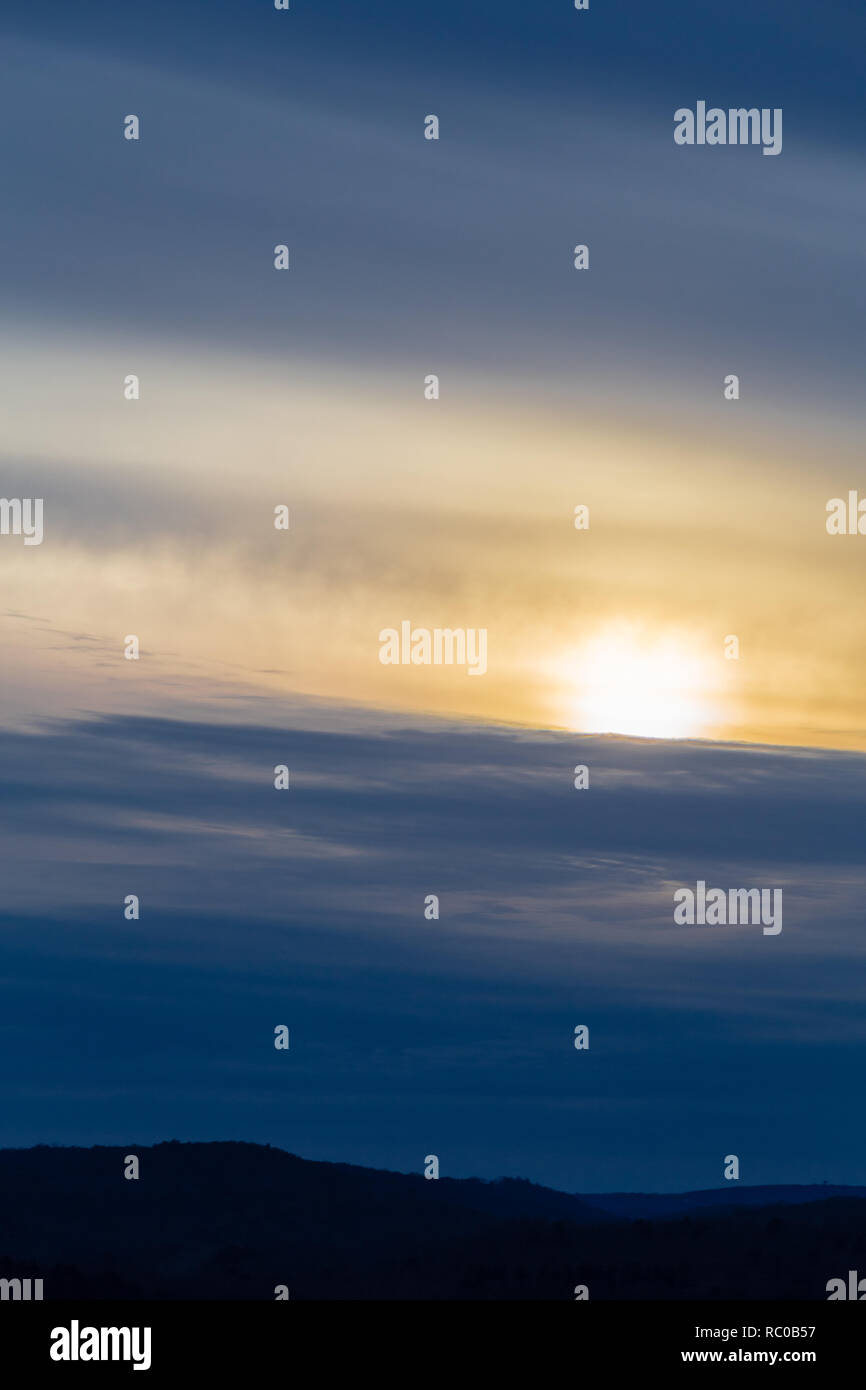 Sunset taken into the sun Stock Photo - Alamy