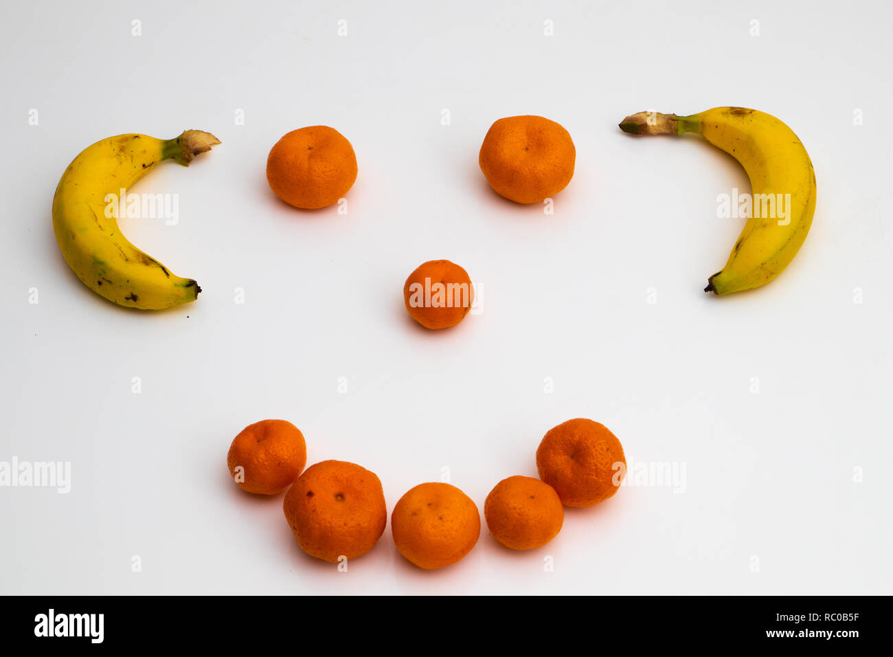 Smiley face made fruits banana hi-res stock photography and images - Alamy