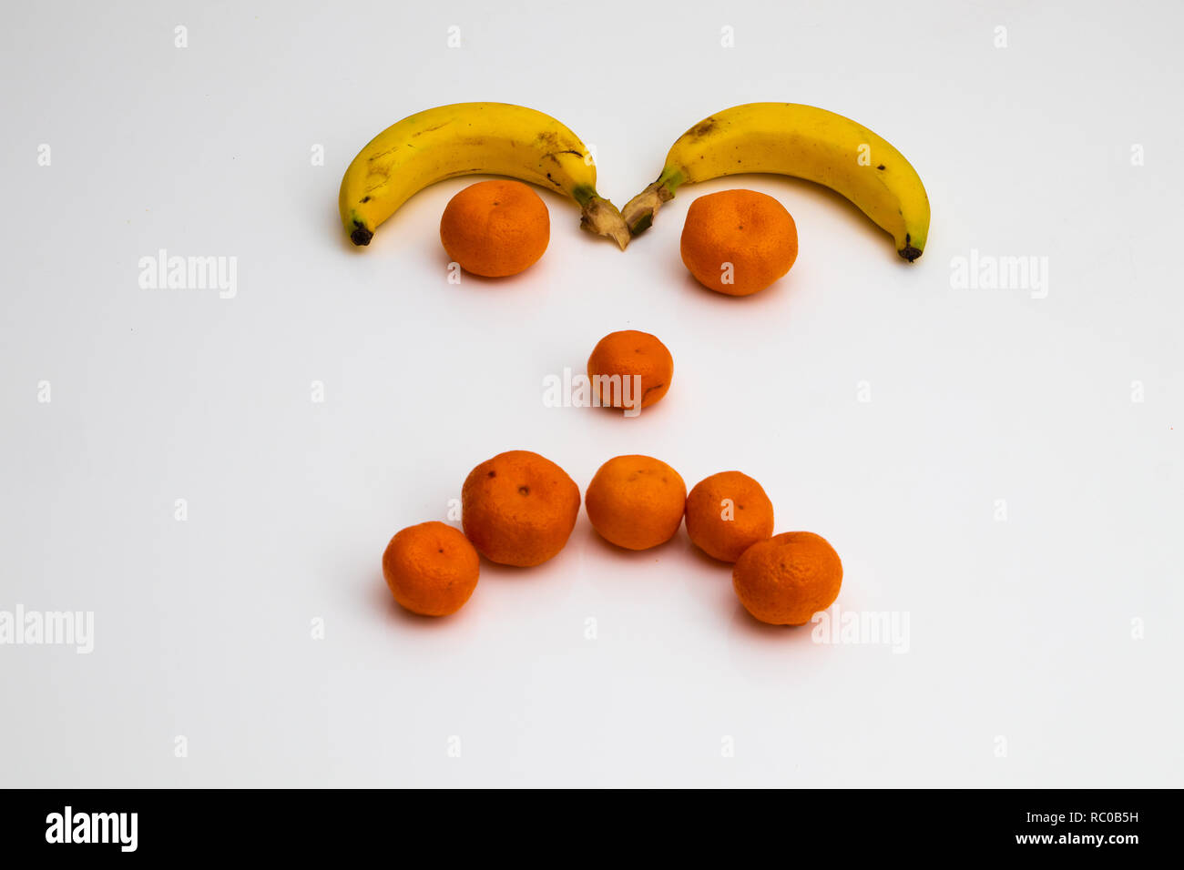 Face from fruits on white background. face made with fresh fruits ...