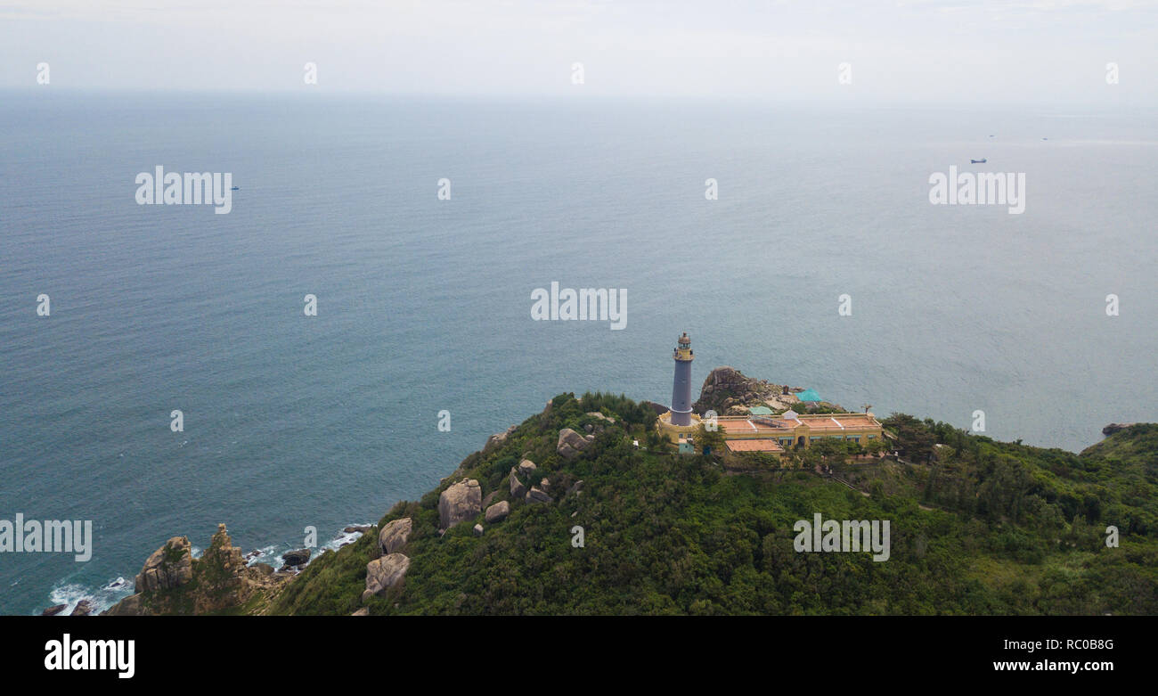 Aerial view of Dai Lanh beach and Mui Dien light house in a sunny day ...