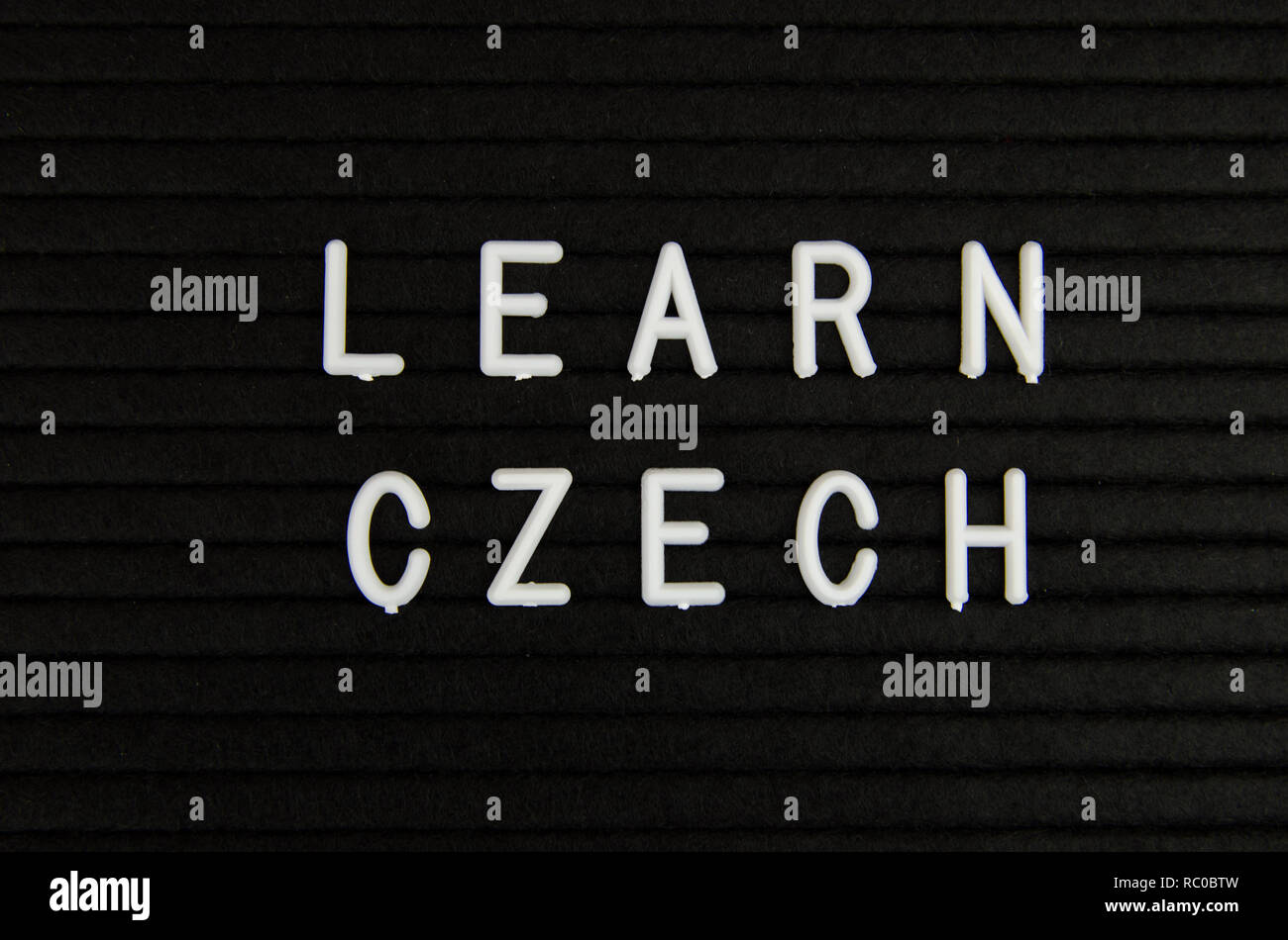 Learn Czech language. Black and white motivational sign Stock Photo - Alamy