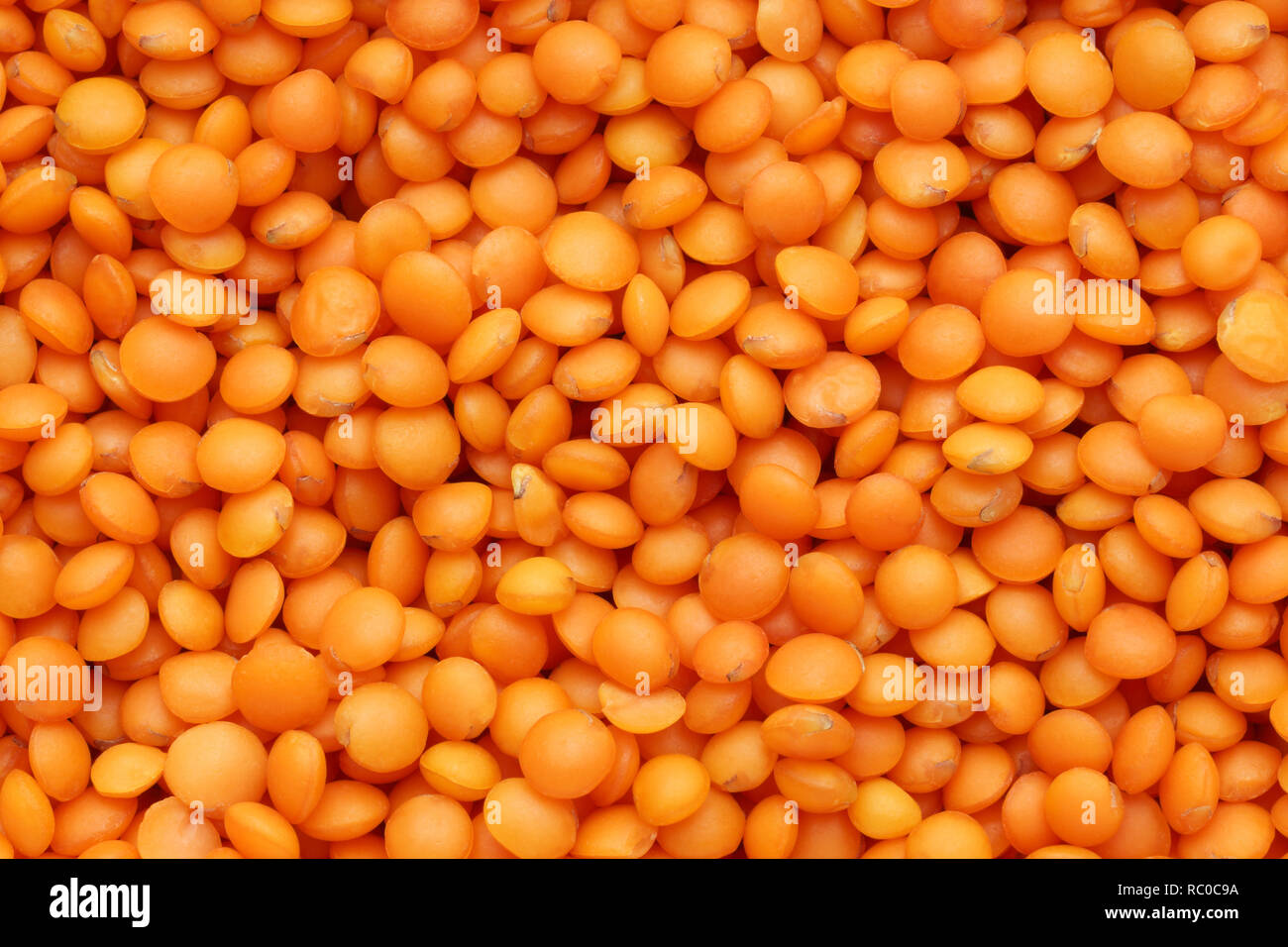 Background of red lentil. Macro shot, full frame Stock Photo - Alamy