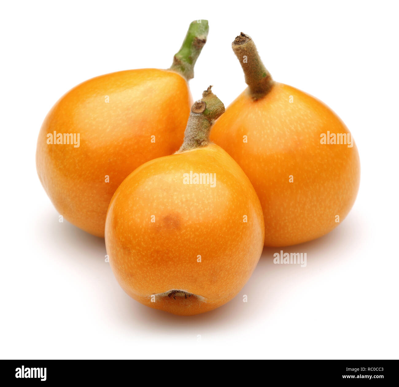 Ripe loquat, isolated on white background Stock Photo - Alamy