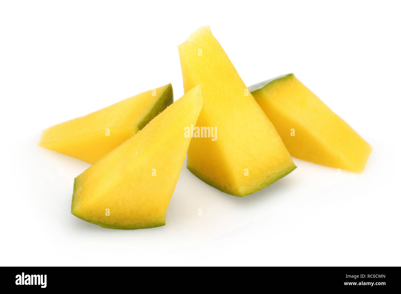 Mango slice cut isolated on white background Stock Photo - Alamy