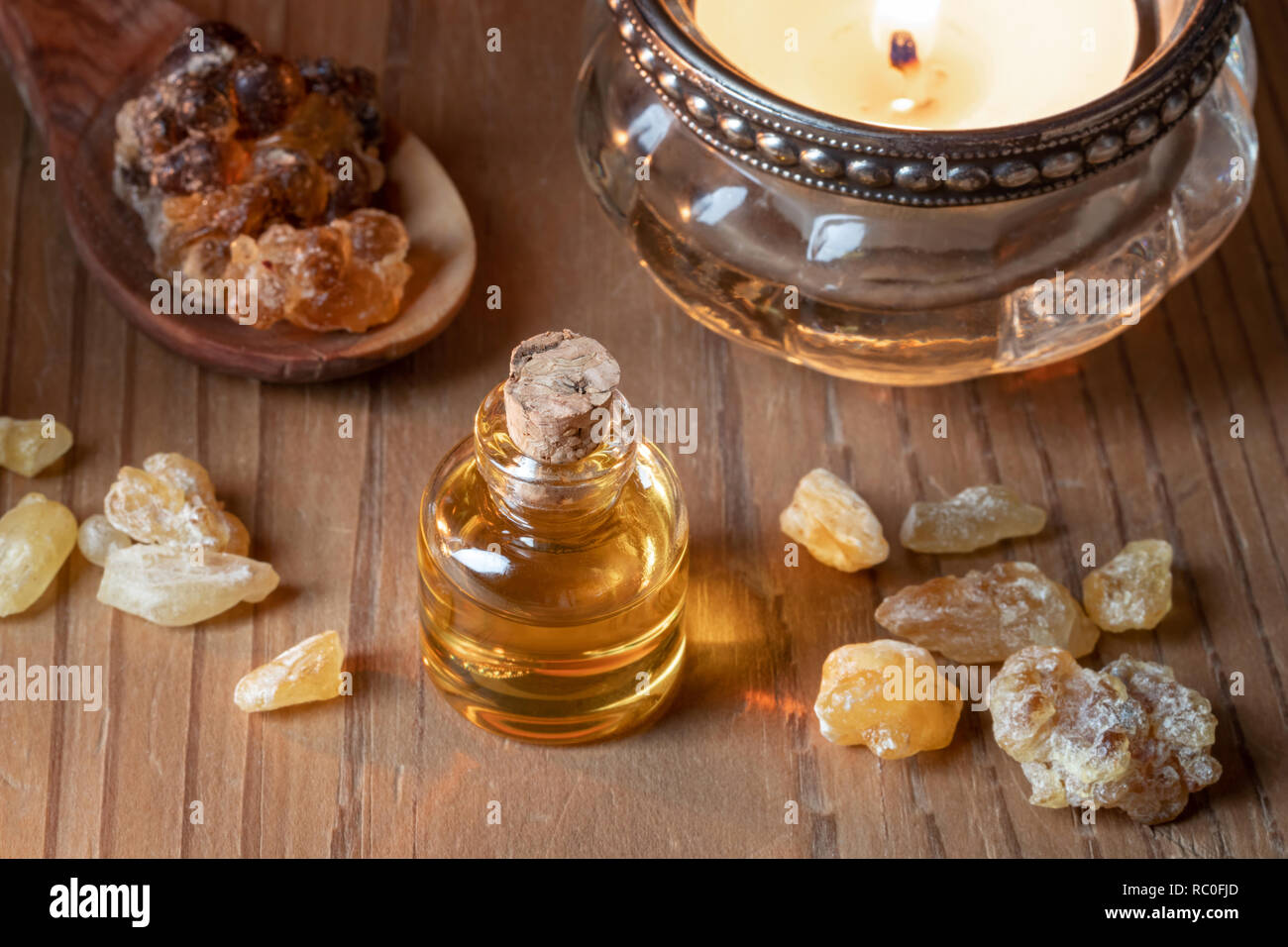A bottle of essential oil with frankincense resin Stock Photo - Alamy