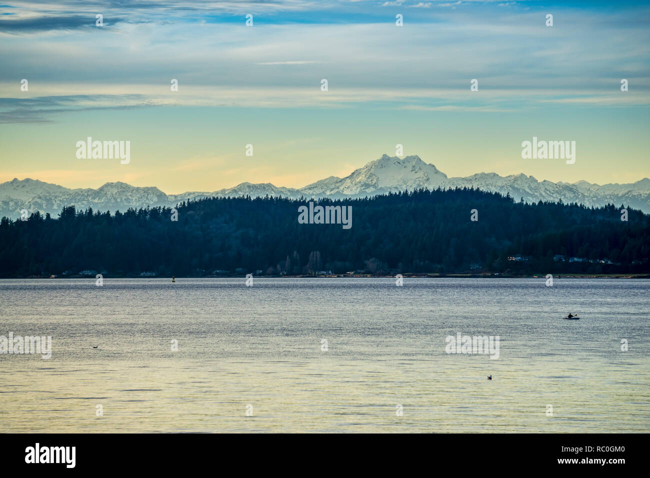 A view of the Olympics Mountain across the Puget Sound at sunset Stock ...