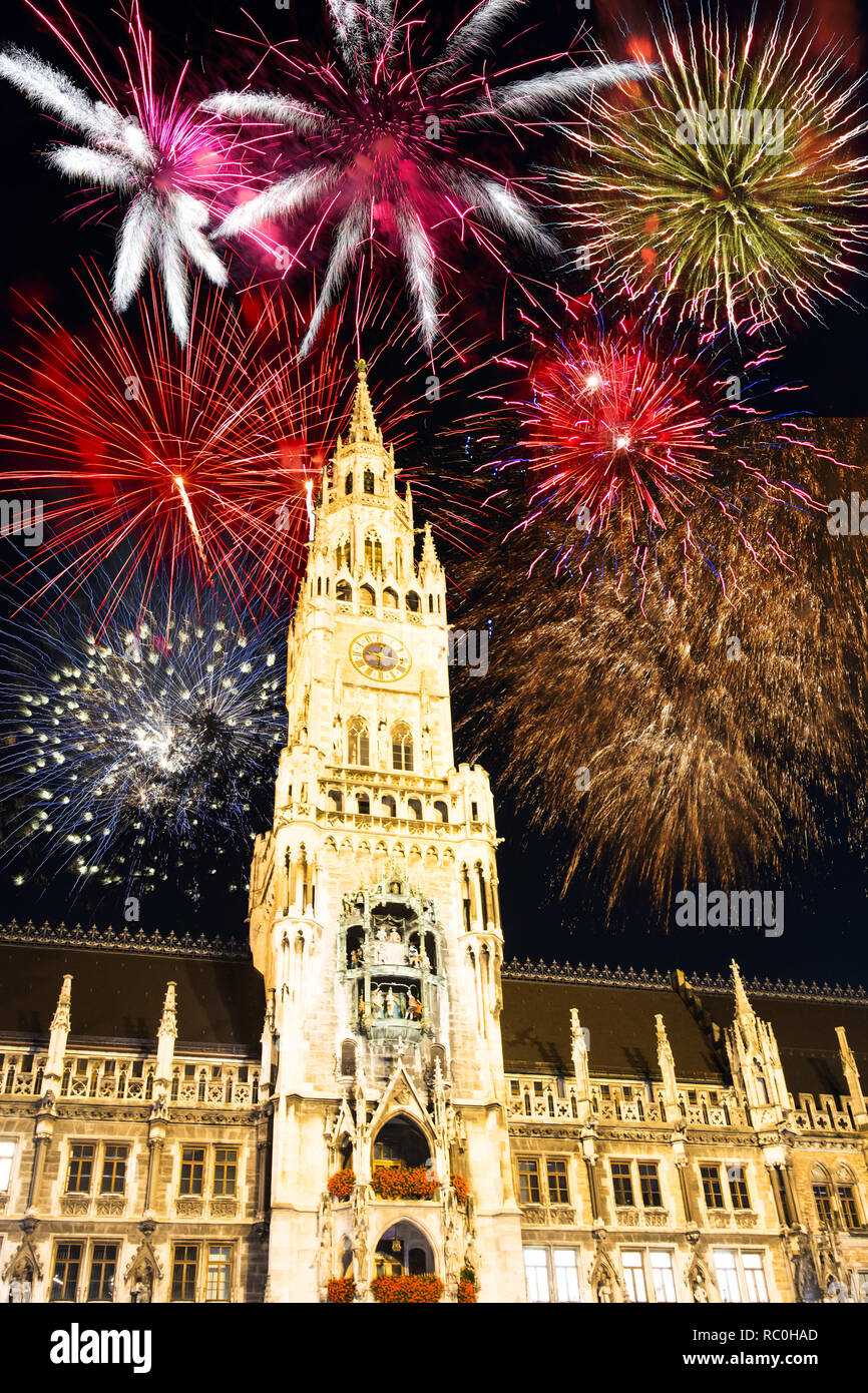 Fireworks at the illuminated Town Hall of Munich (Bavaria, Germany) at ...