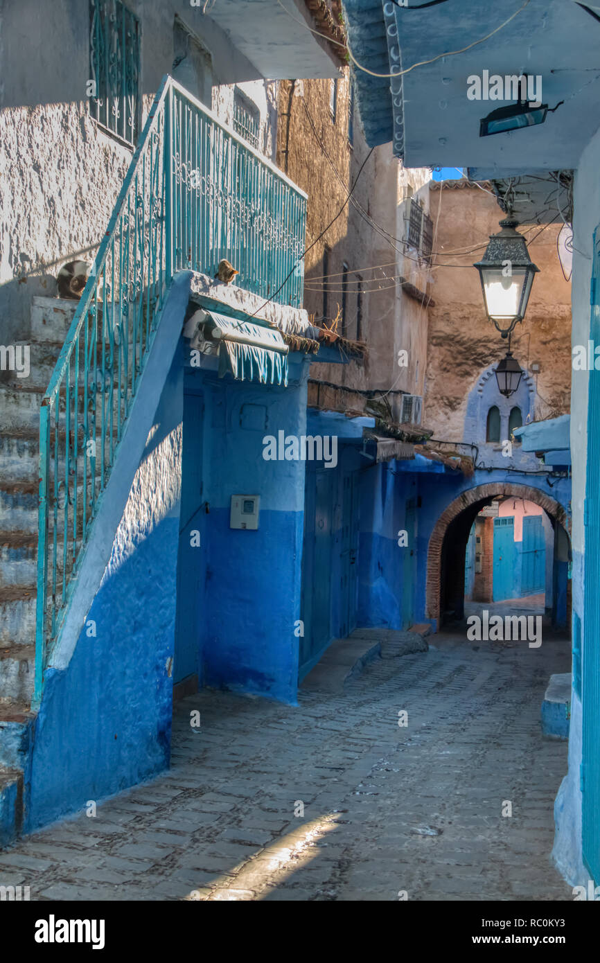Alley with arches in Chaouen, the called blue city, a beautiful town in ...
