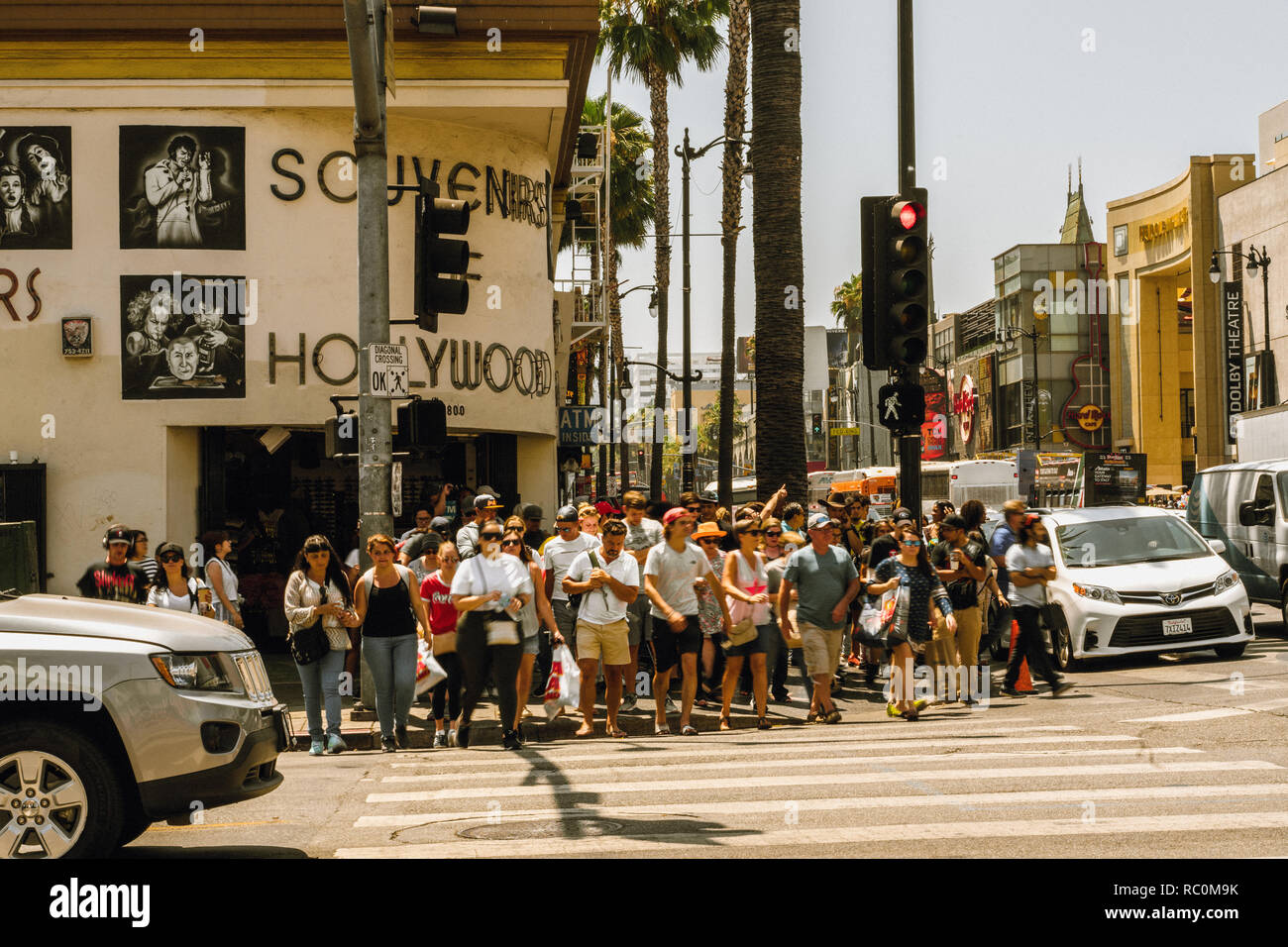 Hollywood Boulevard, Pedestrians cross traffic on Hollywood Boulevard ...