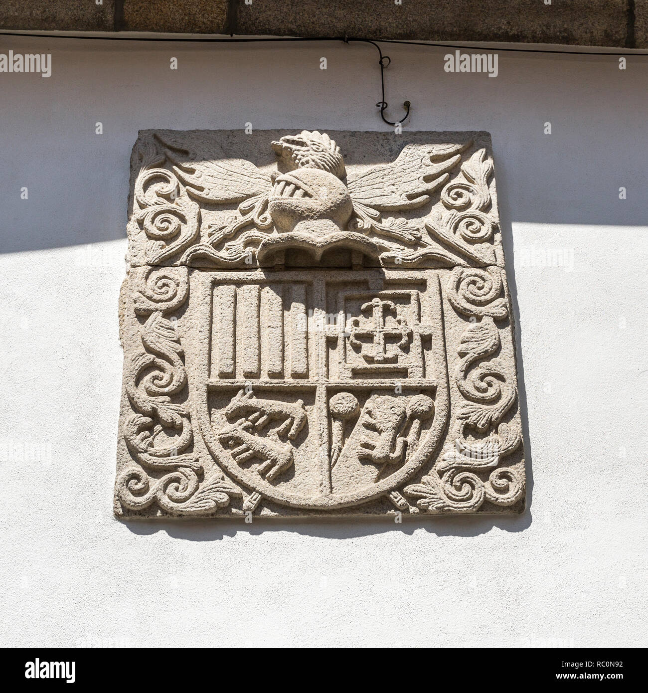View of a granite stone made coat of arms placed on the facade of an ...