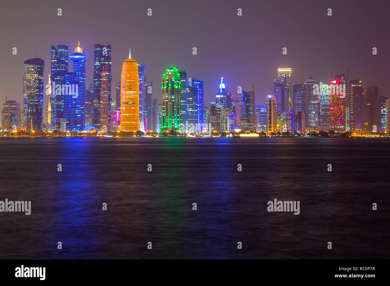 Doha city skyline night view, Qatar Stock Photo - Alamy