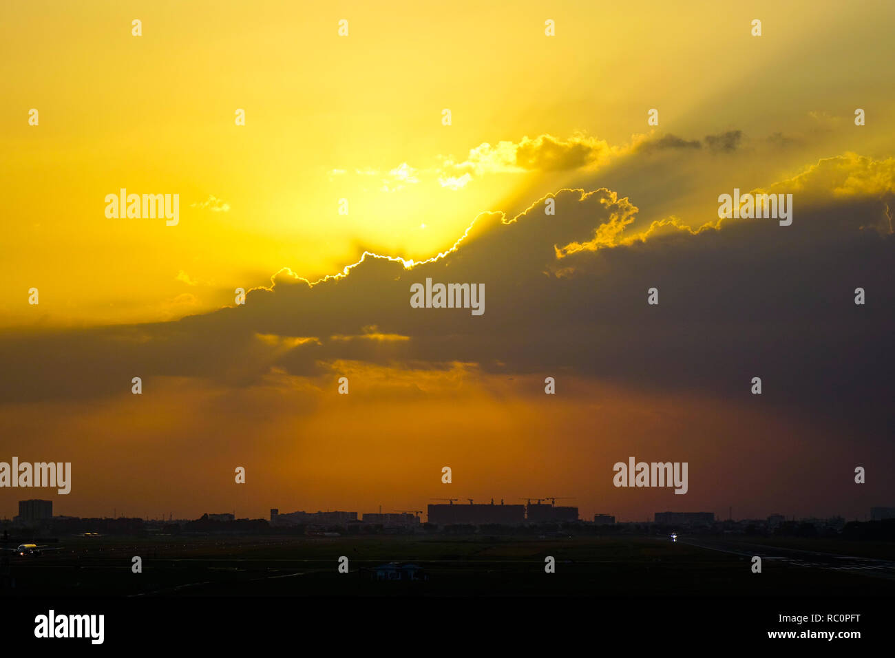 Beautiful sunset on the civil airport in Saigon, Vietnam Stock Photo ...