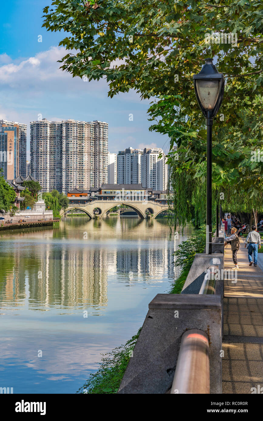 CHENGDU, CHINA - SEPTEMBER 25: View of a riverside path and city ...