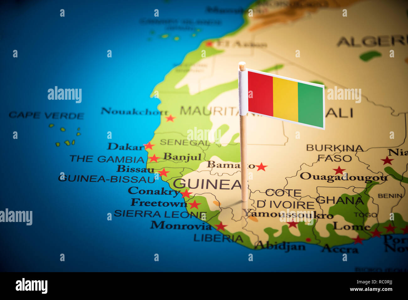 guinea Belgium marked with a flag on the map Stock Photo - Alamy
