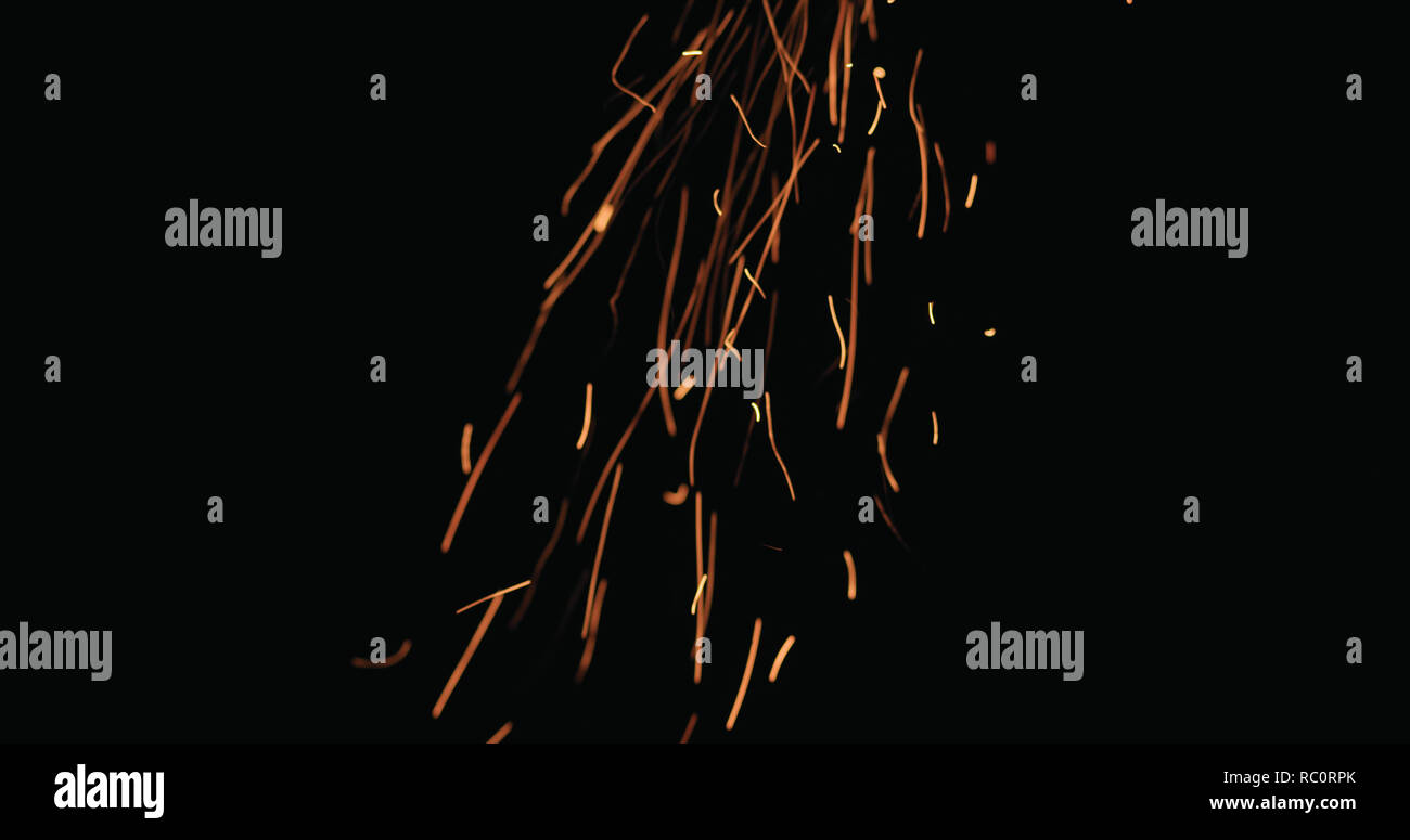 hot sparks falling from above black background, wide photo Stock Photo ...