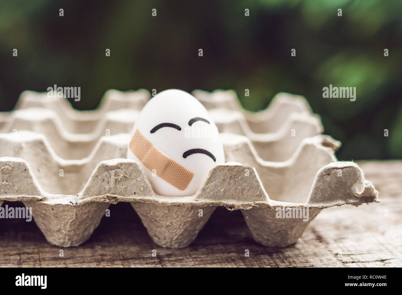 Cracked egg bandage hi-res stock photography and images - Alamy