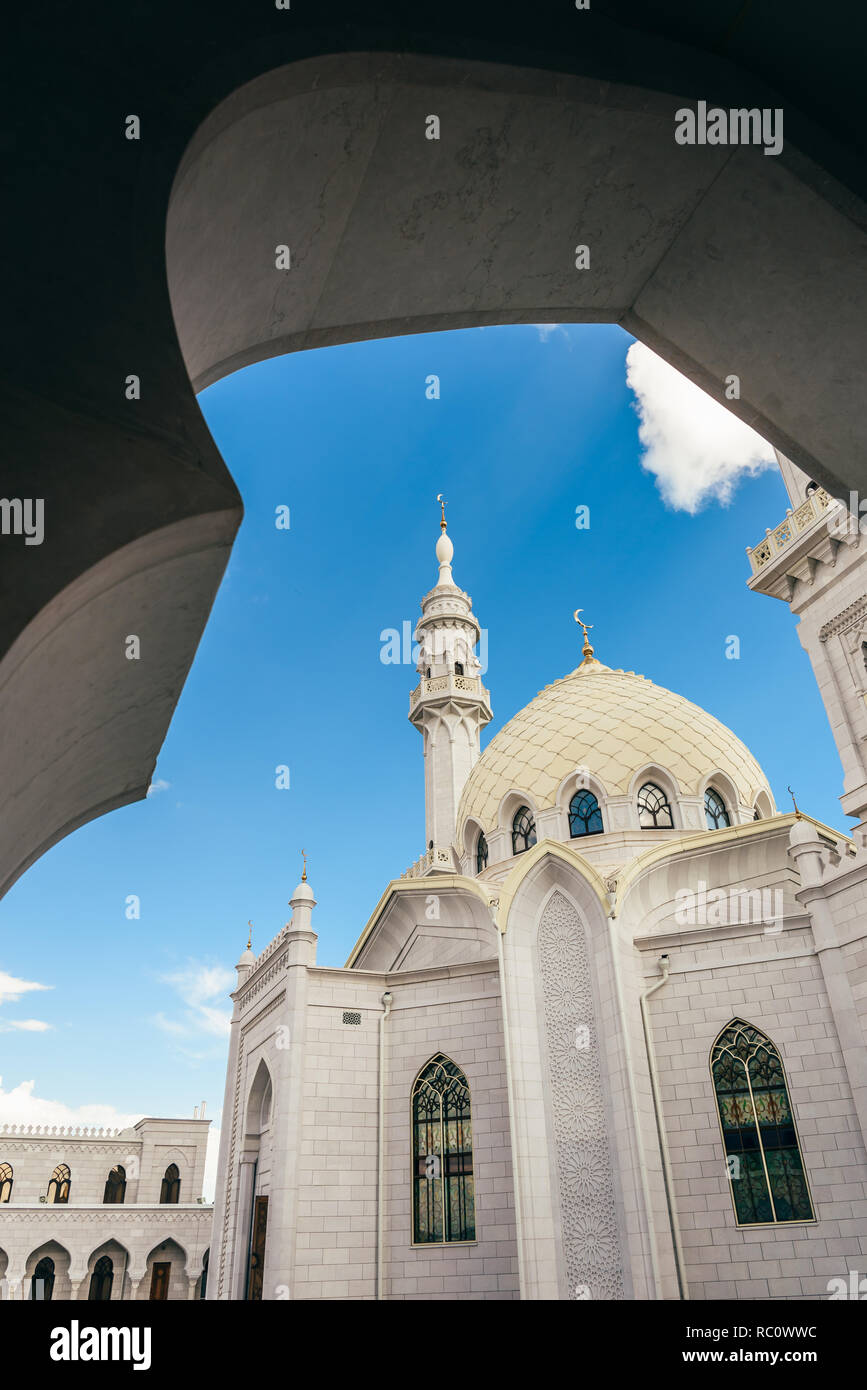 Beautiful White Mosque with Dome and Minaret. View through the Arch ...