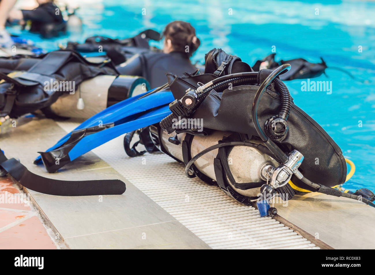 Equipment for diving is on the edge of the pool, ready for a lesson ...