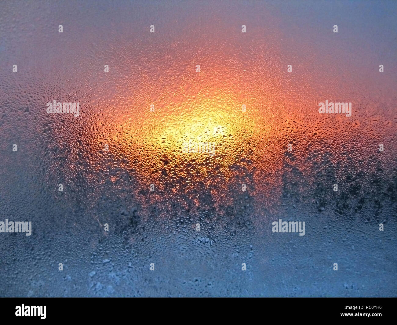 Water drops and sunlight on window glass Stock Photo - Alamy