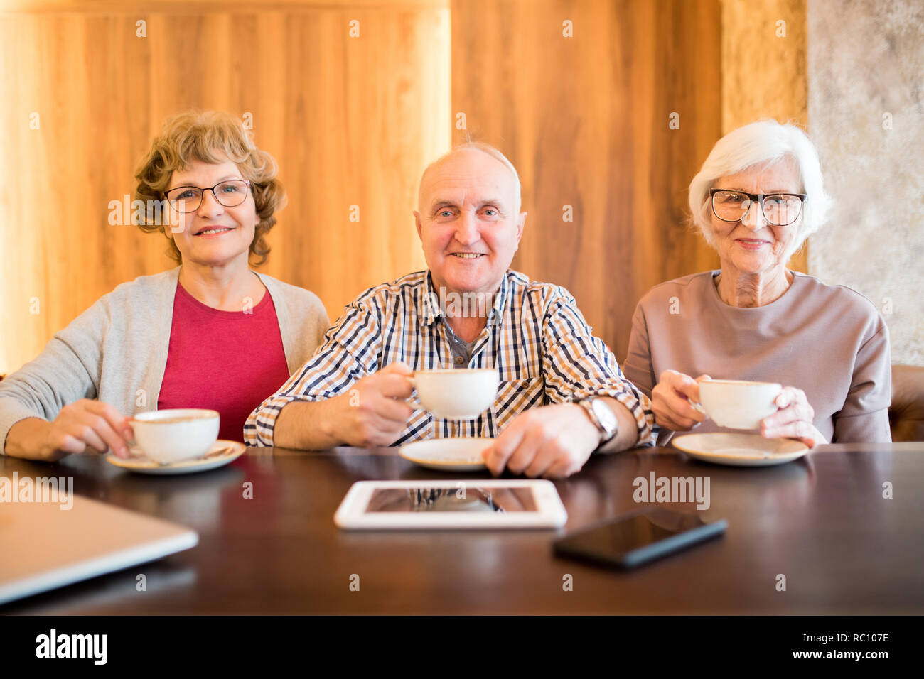Cheerful group in cafe hi-res stock photography and images - Alamy
