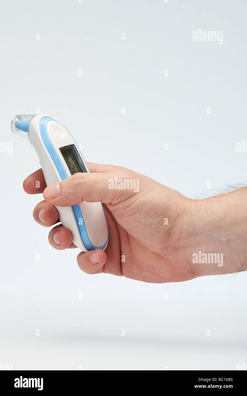 Hand holding thermometer hi-res stock photography and images - Alamy