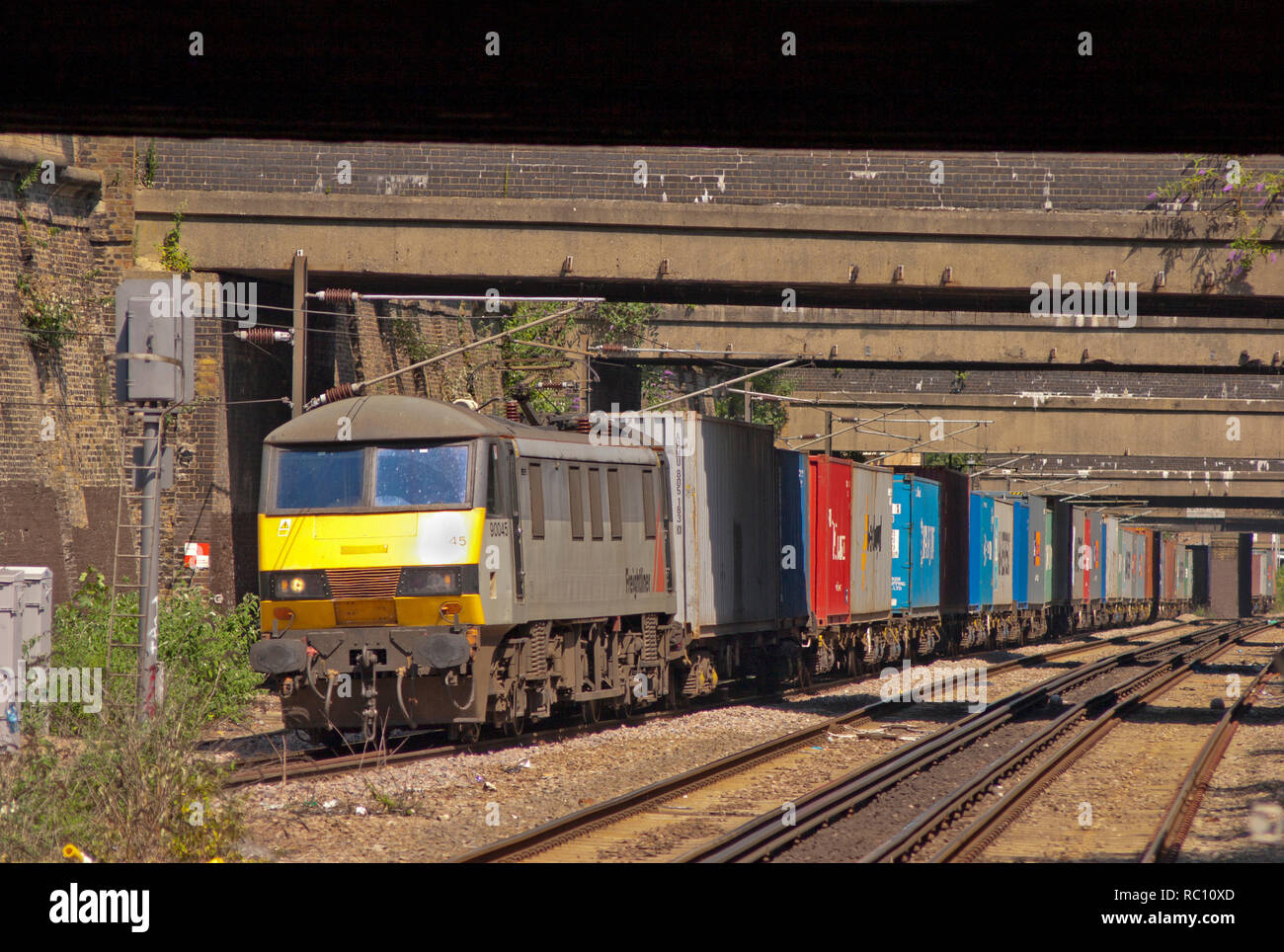 A class 90 electric locomotive number 90045 approaching Caledonian Road ...