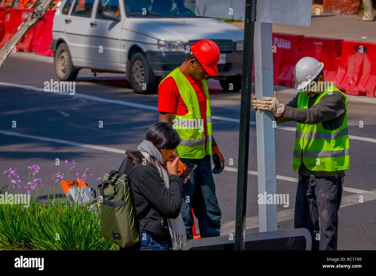 SANTIAGO DE CHILE, CHILE - OCTOBER 16, 2018: Outdoor view of worker ...
