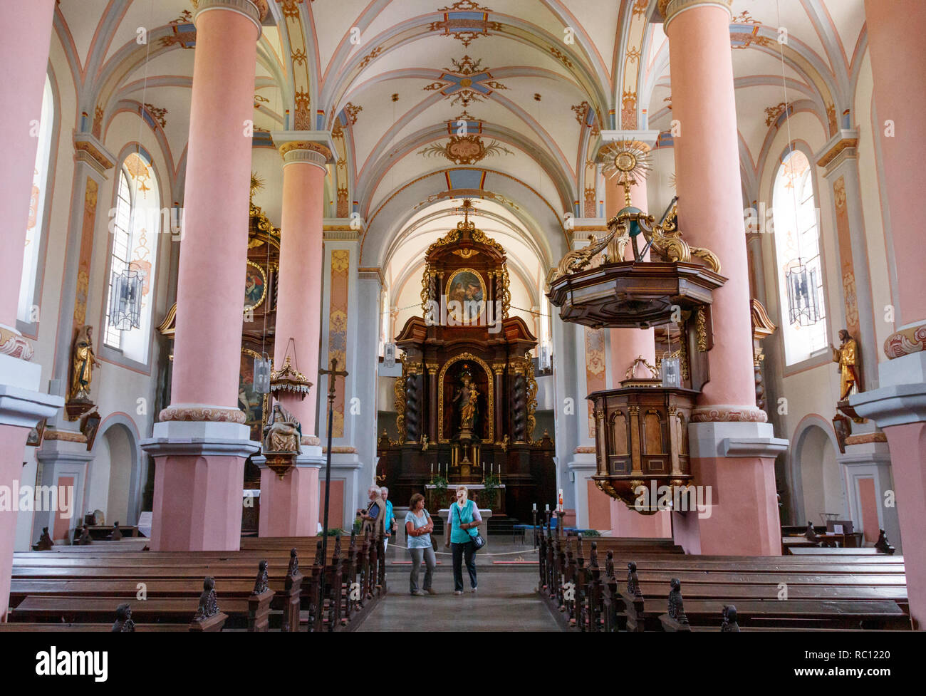 Tourists visiting Beilstein's Saint Joseph's monastery church with its ...