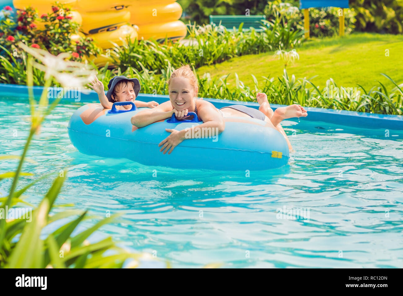 Mom and son have fun at the water park Stock Photo - Alamy
