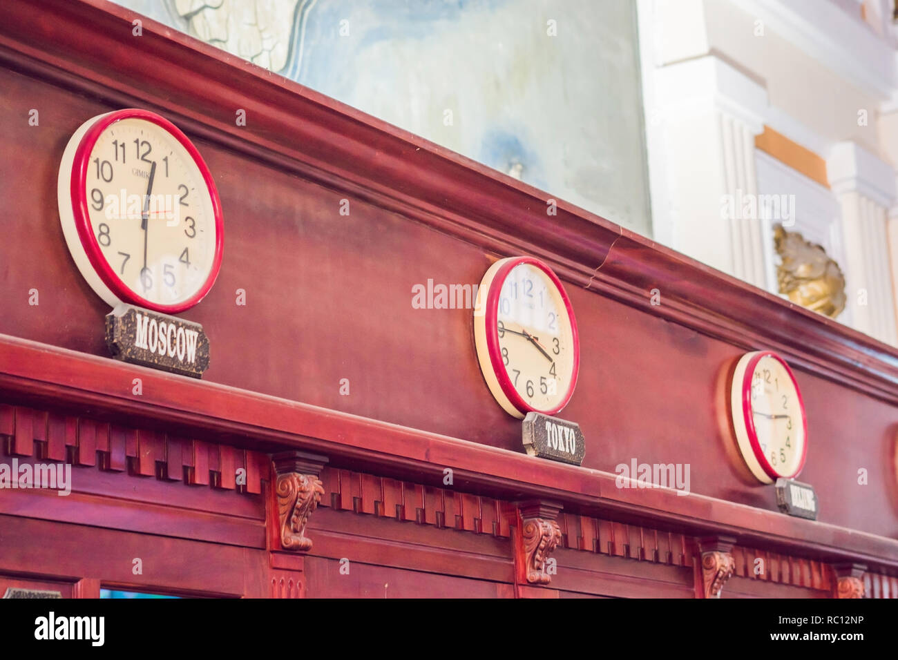 wall clocks showing time in different capitals of the world Stock Photo ...