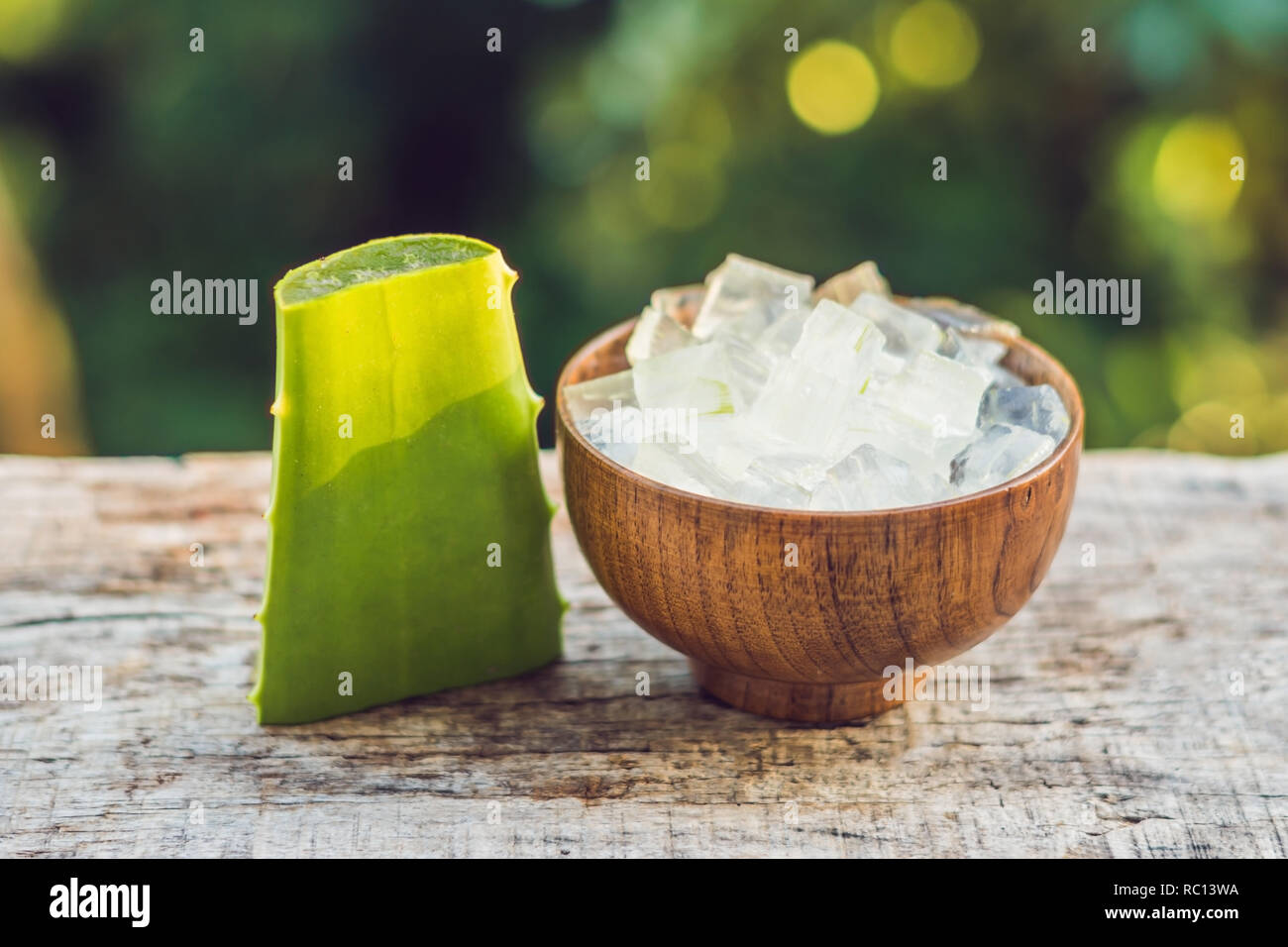 Aloe vera and aloe cubes in a wooden bowl. Aloe Vera gel almost use in ...