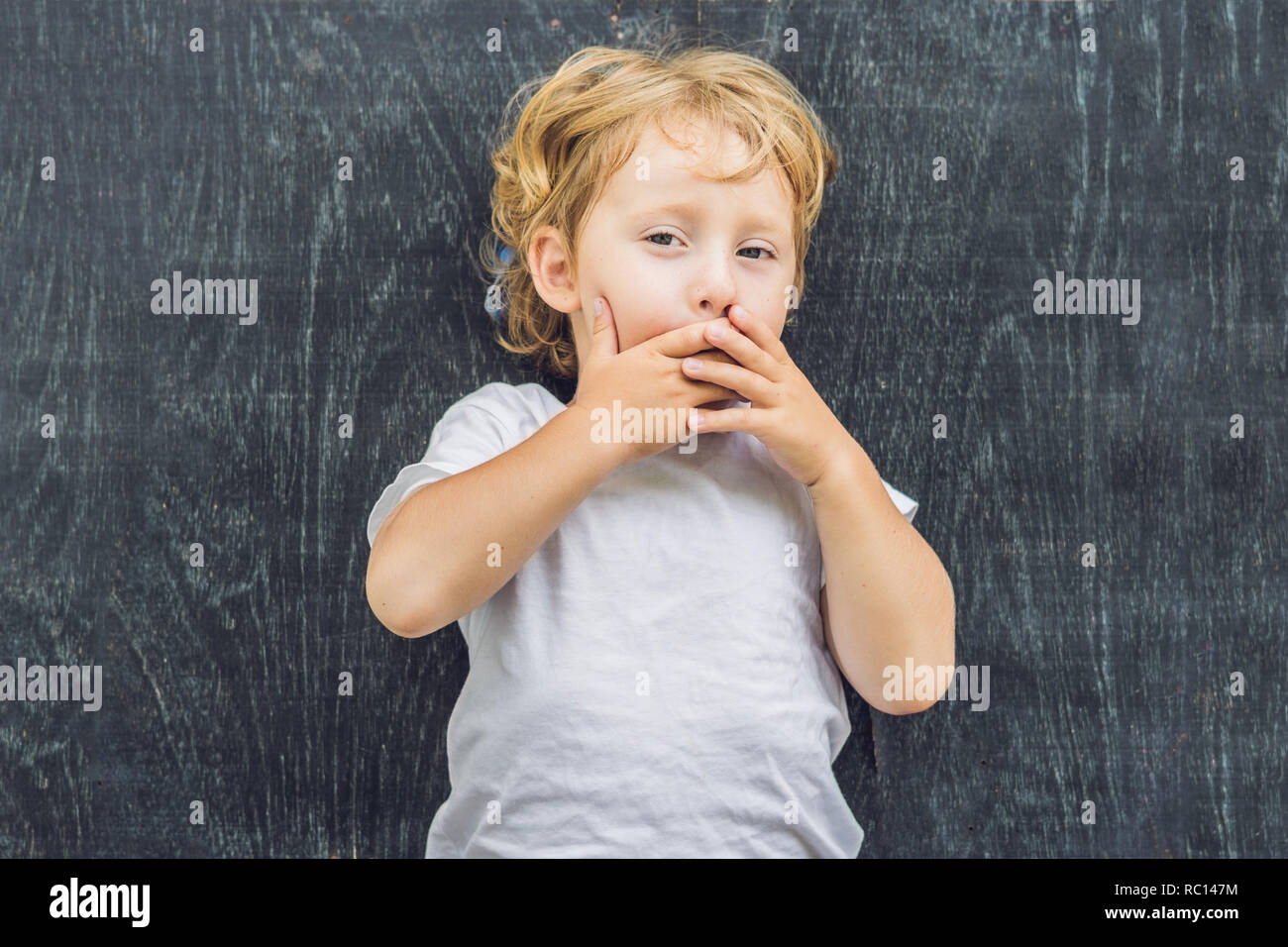 Top view of a little blond kid boy with space for text and symbols on ...