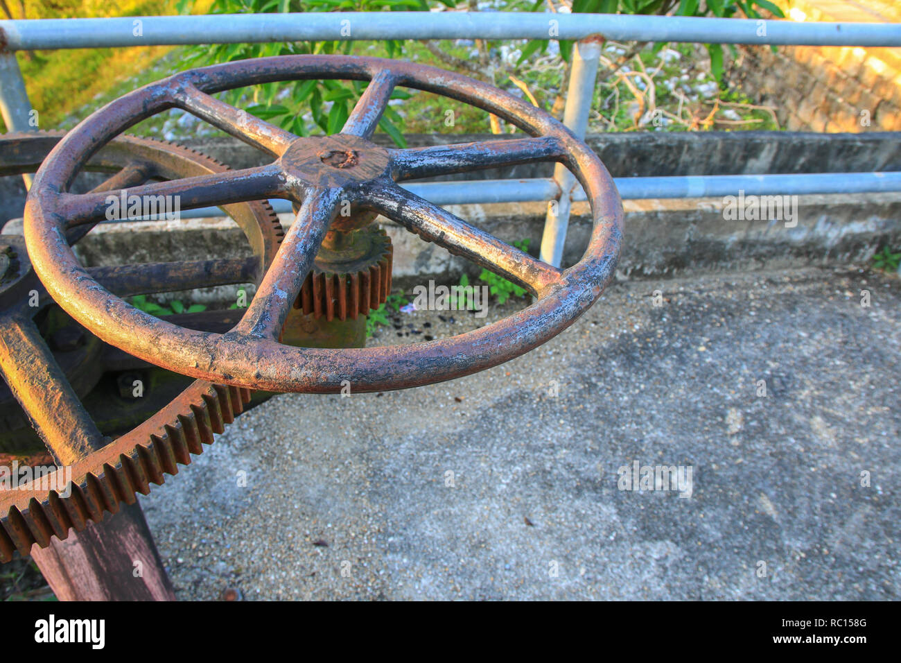 rusty gear toothed wheels old water valve select focus with shallow ...