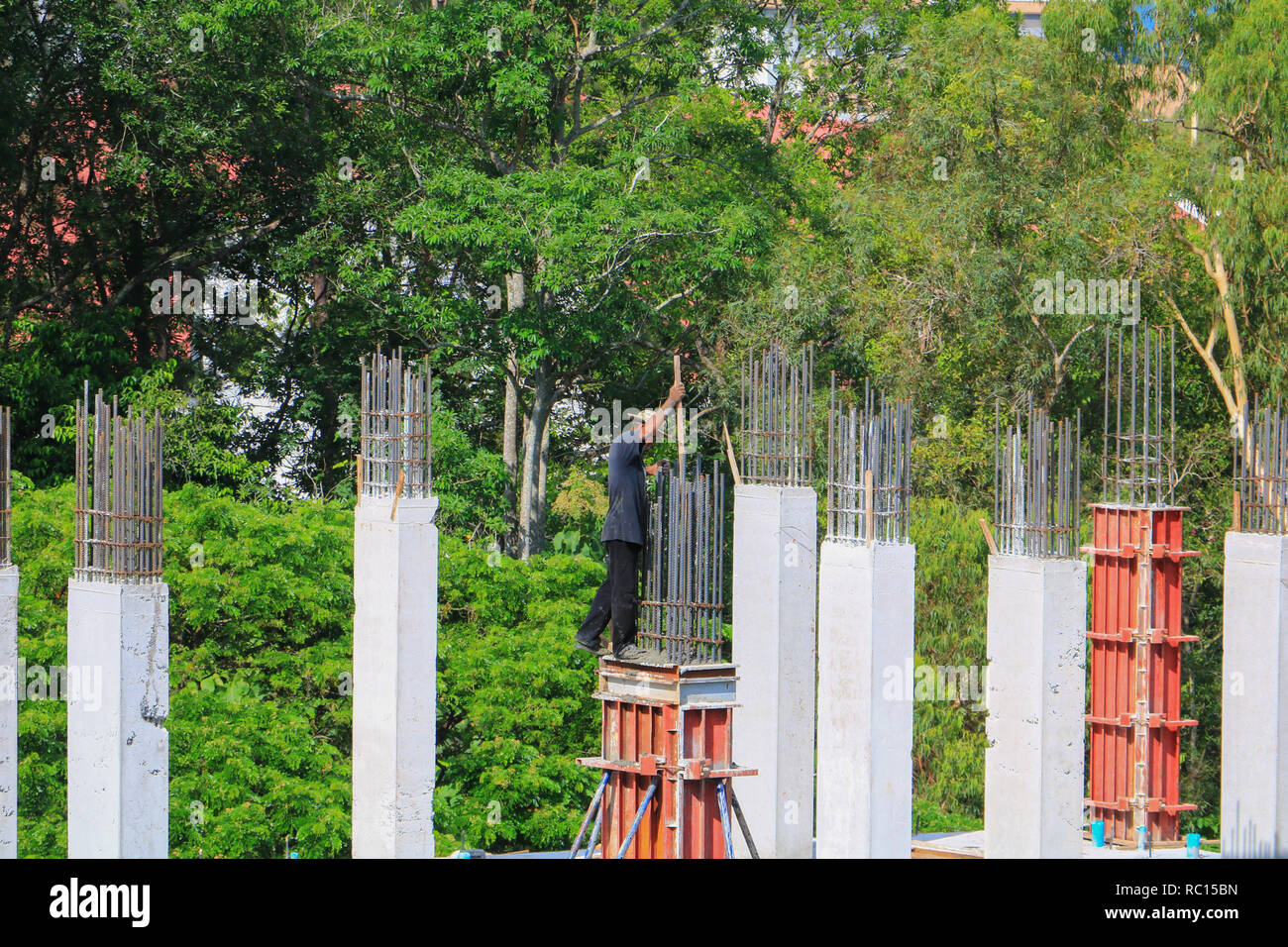 construction laborer team working on high ground building commercial in ...