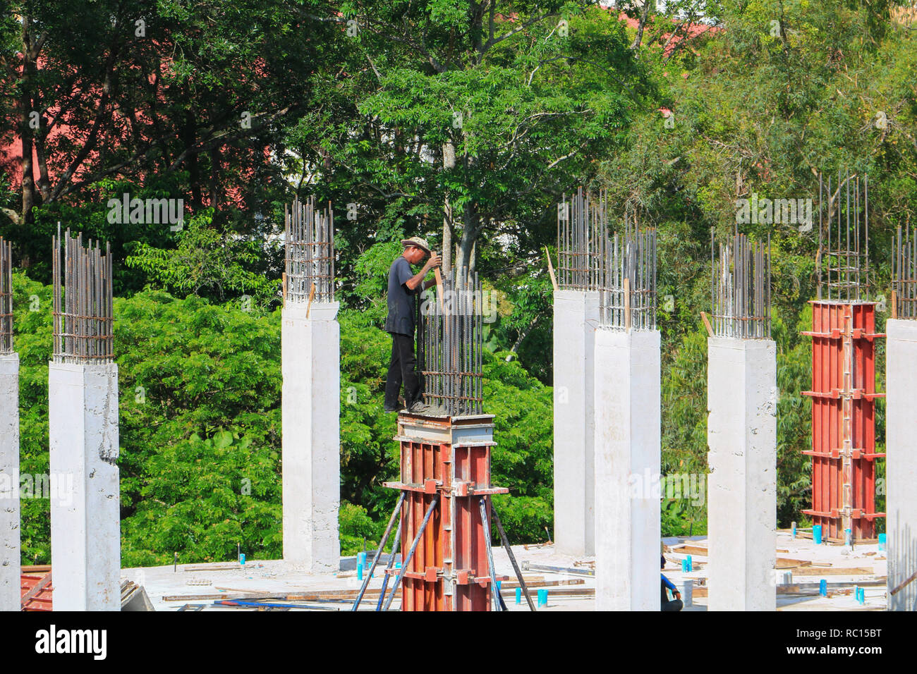 construction laborer team working on high ground building commercial in ...
