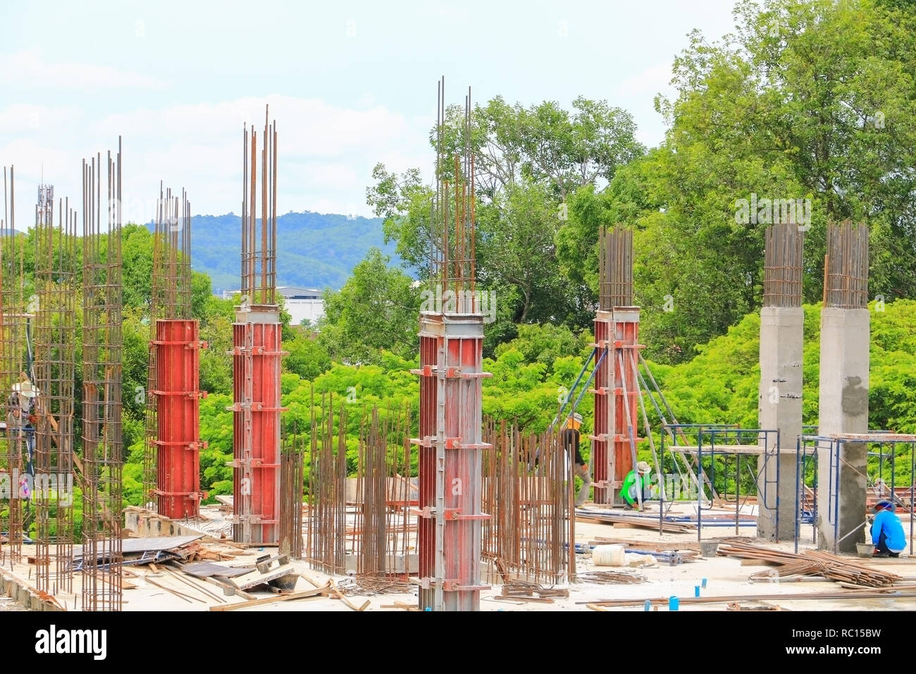 construction laborer team working on high ground building commercial in ...