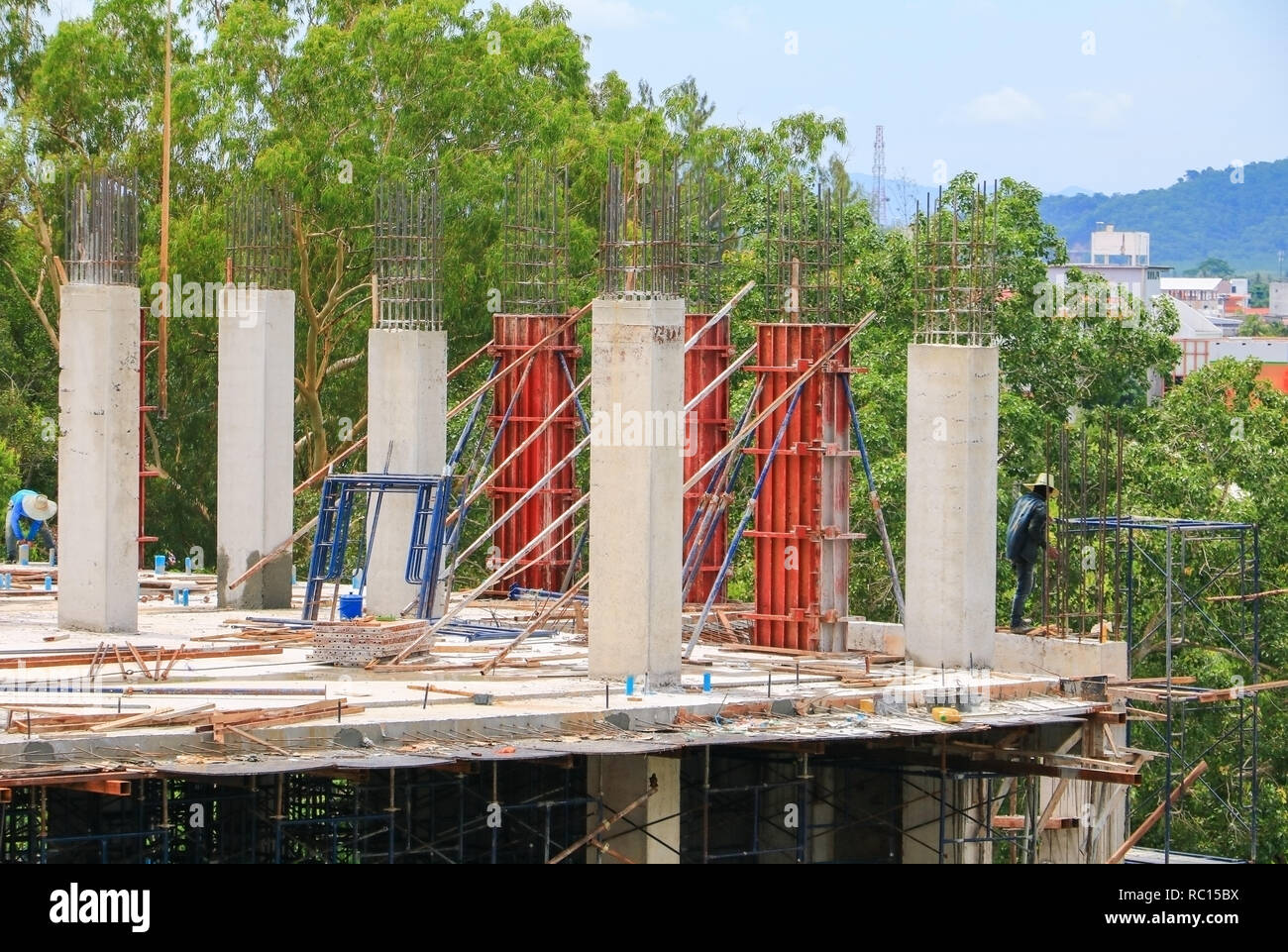 construction laborer team working on high ground building commercial in ...