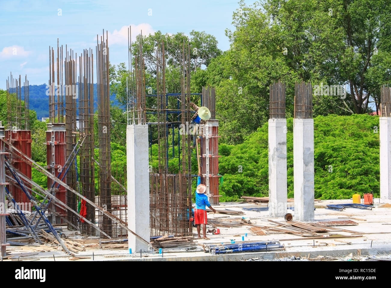 construction laborer team working on high ground building commercial in ...